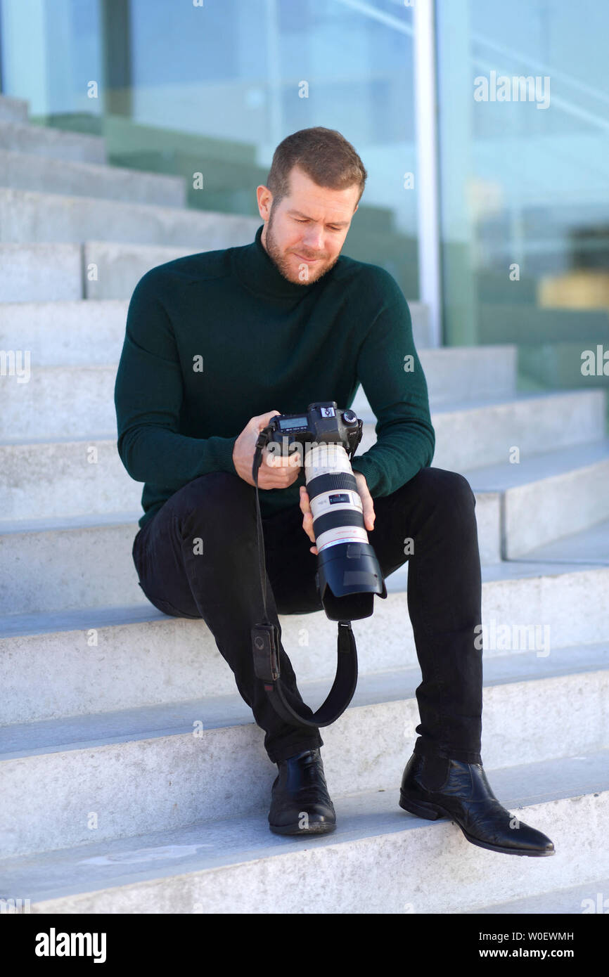 Professional photographer outside Stock Photo - Alamy