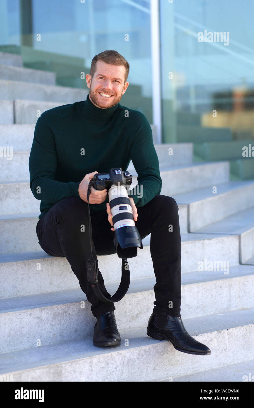Professional photographer outside Stock Photo - Alamy