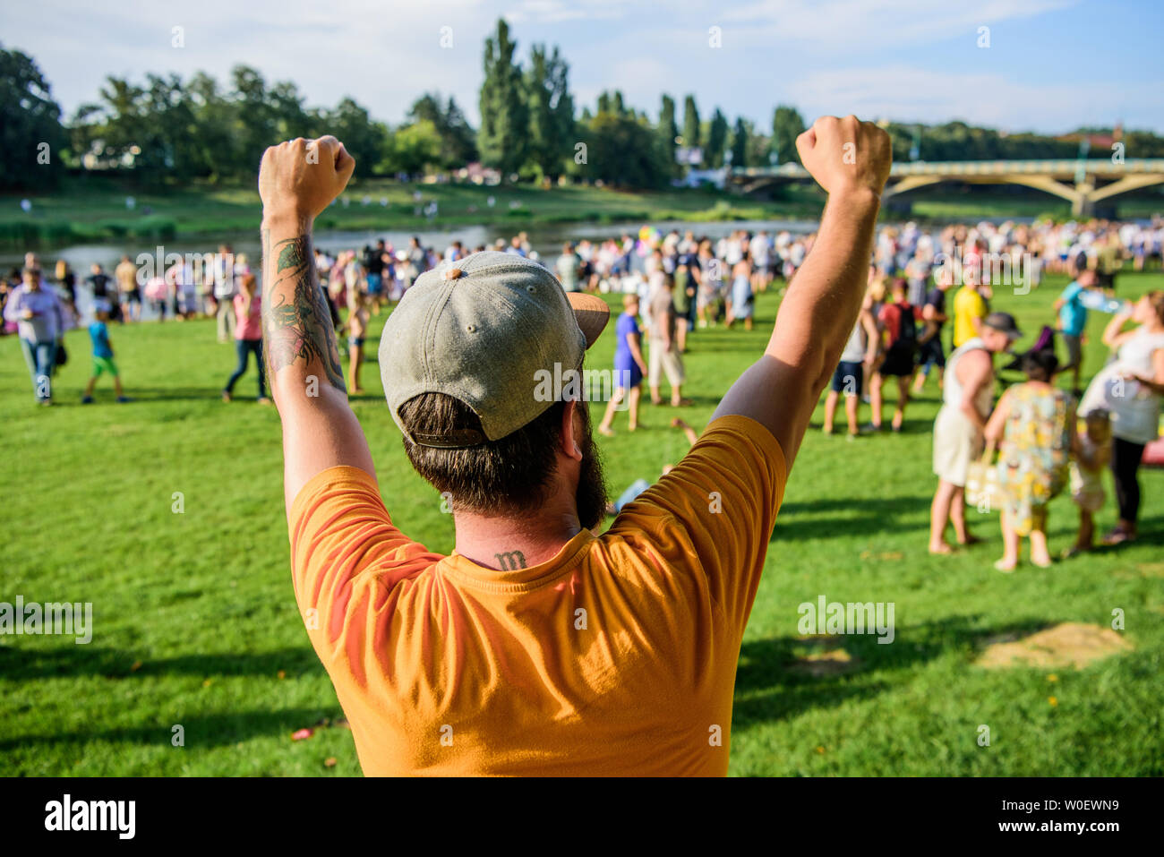 Back view joyful man celebrating hi-res stock photography and images ...