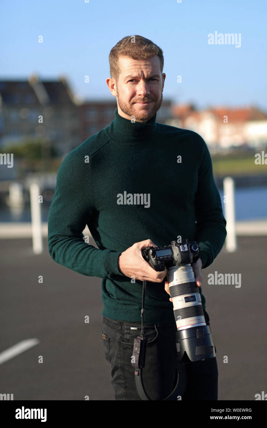 Professional photographer outside Stock Photo - Alamy