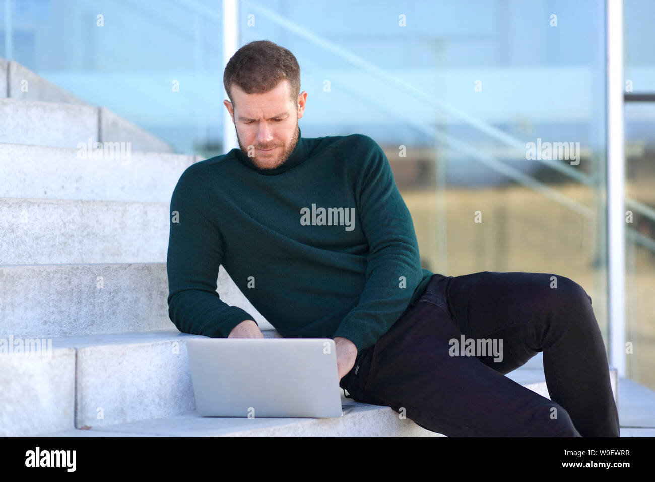Man with computer Stock Photo - Alamy