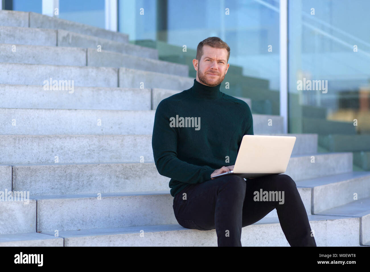 Man with computer Stock Photo - Alamy