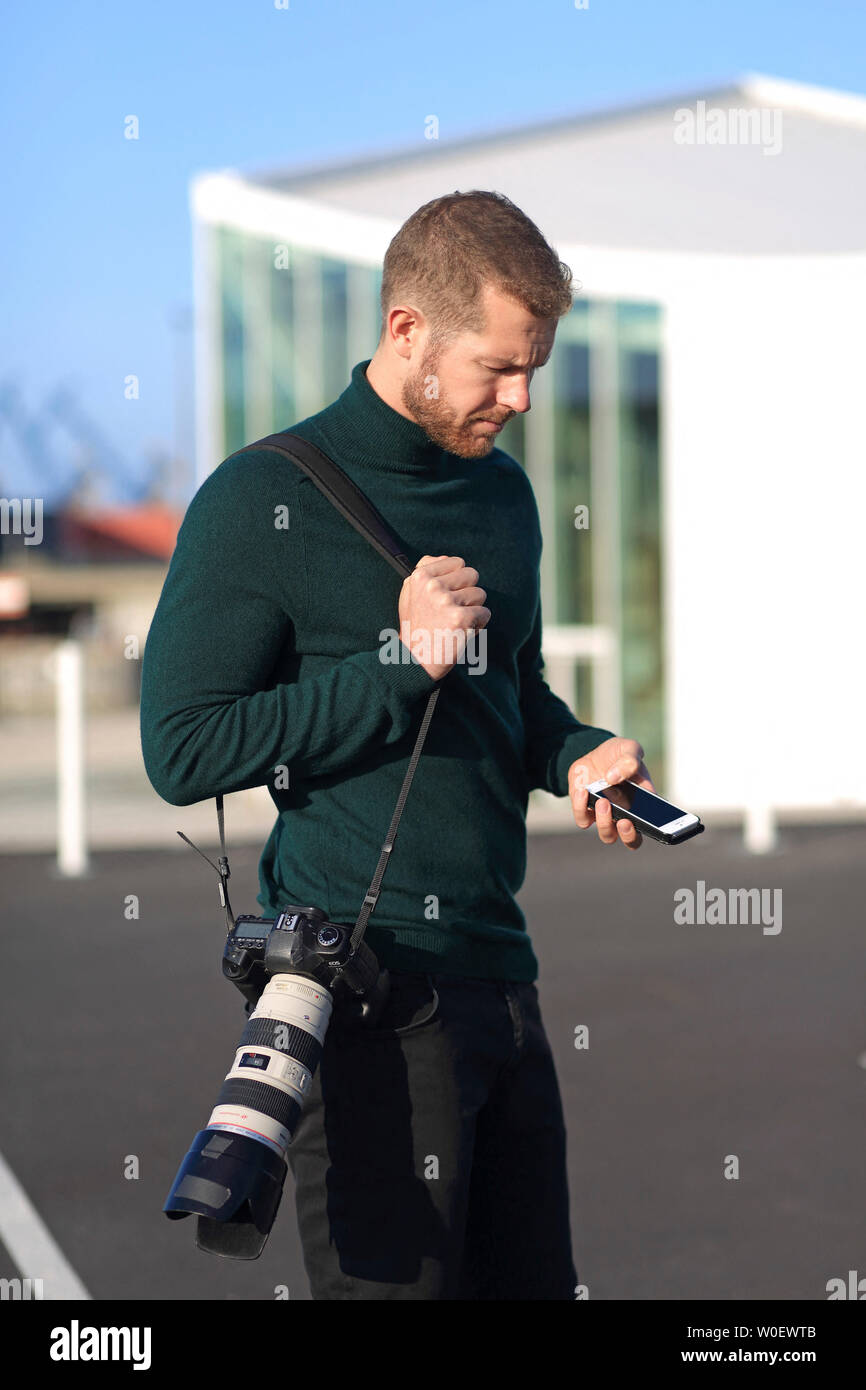 Professional photographer outside Stock Photo - Alamy