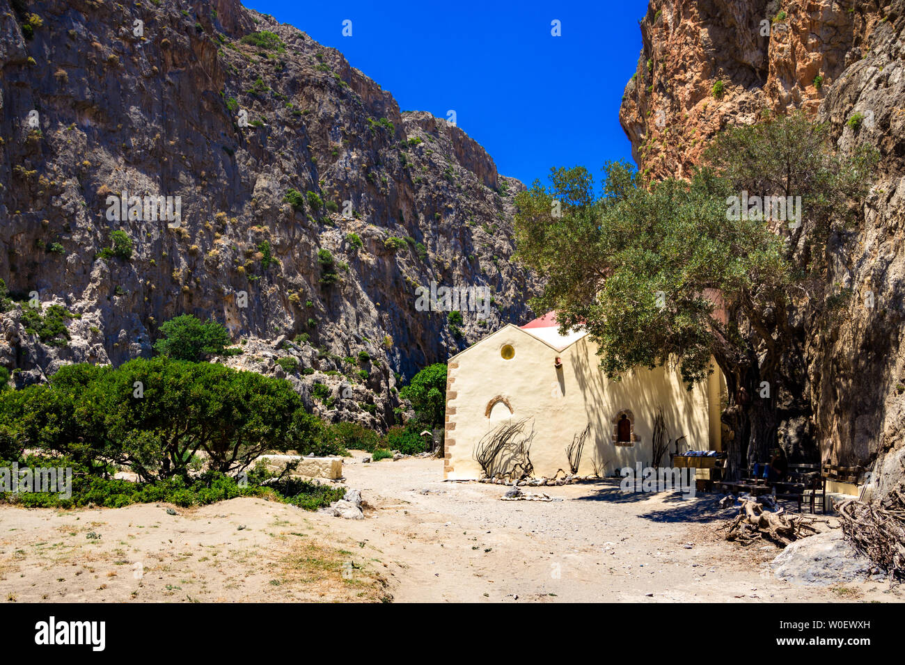 Agiofarago beach with natural caves and stone arches at the end of the ...