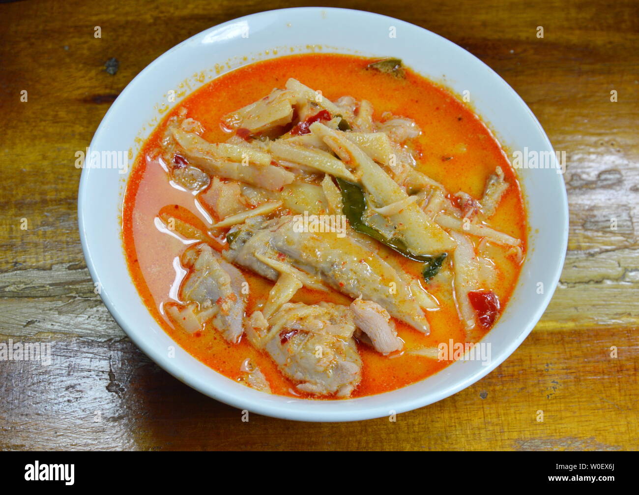 spicy bamboo shoot with chicken in coconut cream and red curry on bowl ...