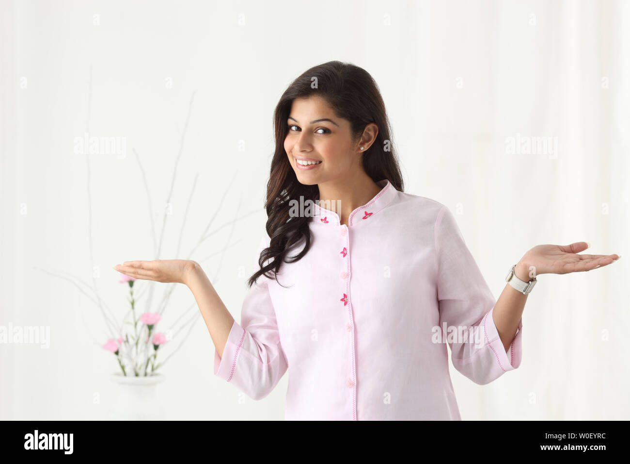 Portrait of an Indian young woman smiling Stock Photo - Alamy