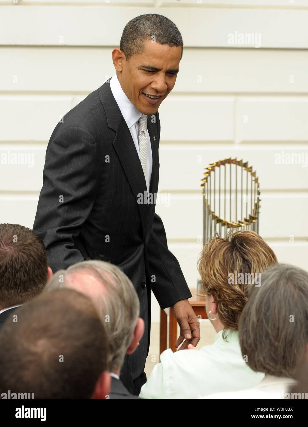 U.S. President Barack Obama greets guests after welcoming the 2008 ...