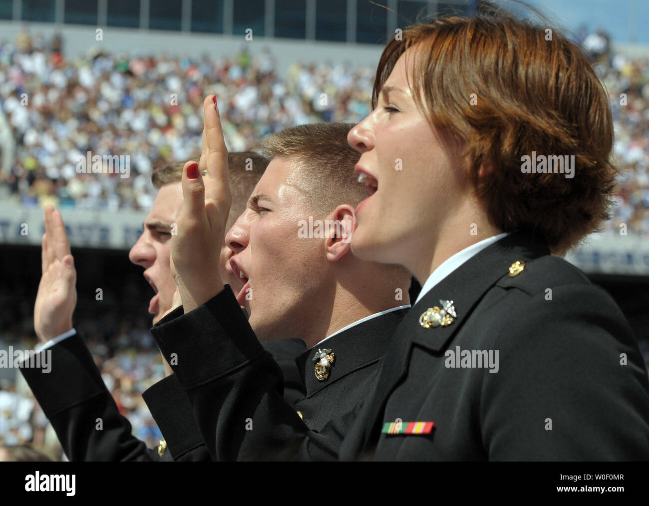 Graduating Marines shout "I DO" as they take the Oath of Office during ...