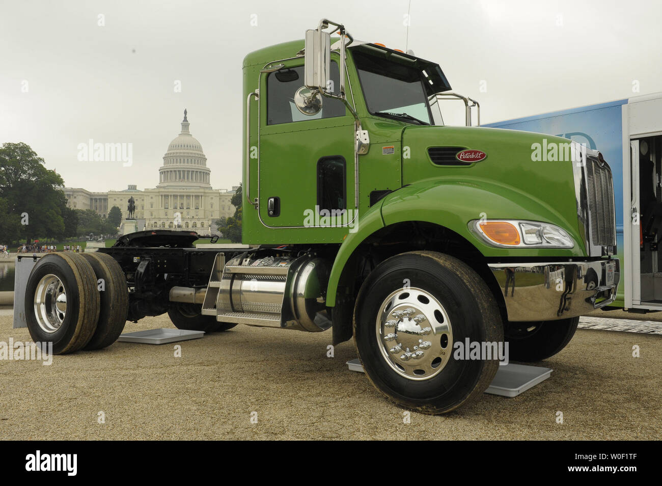 A hybrid tractor trailer truck is seen at a demonstration of "green ...