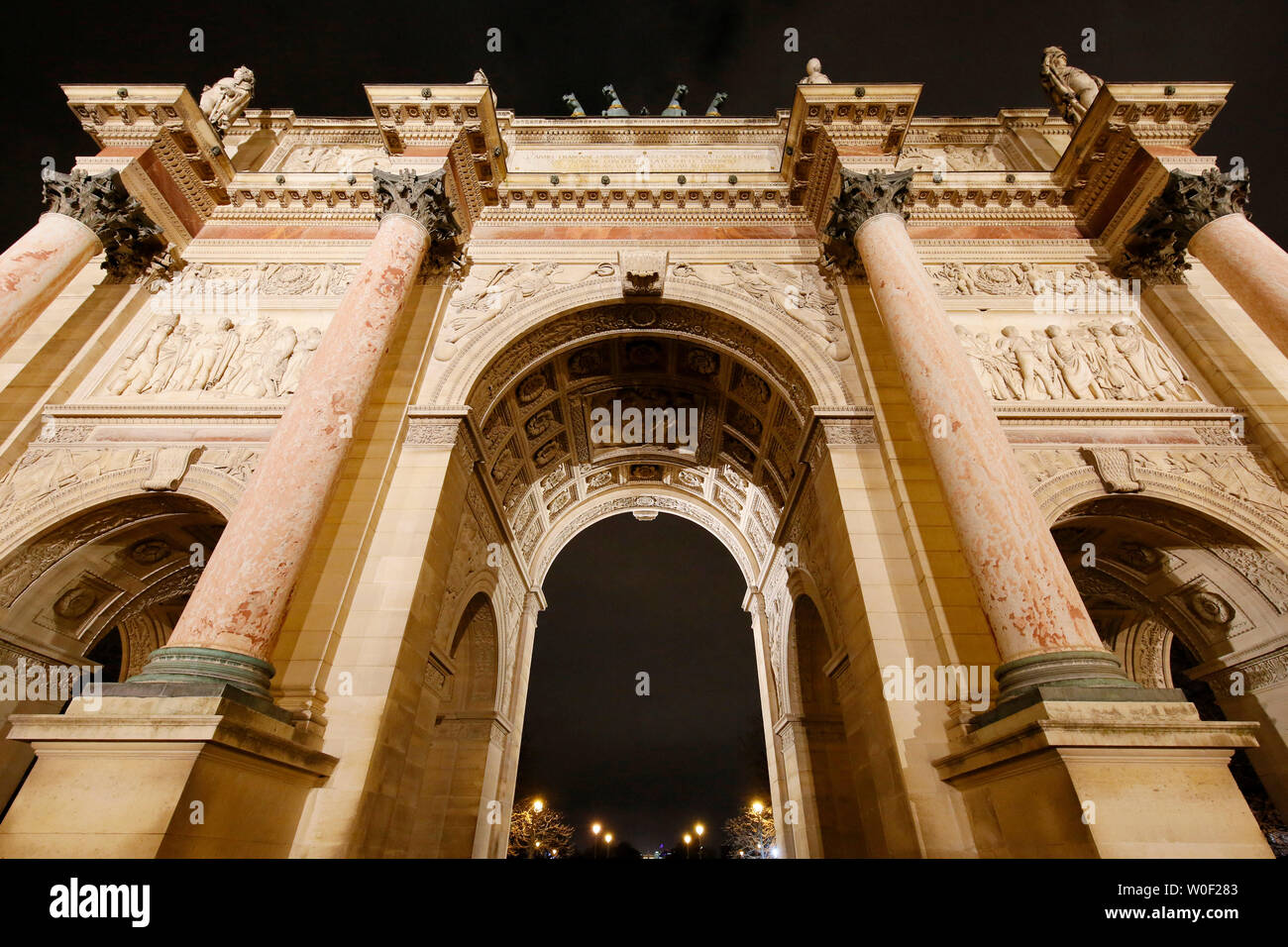 Paris. 1st district. Louvre Museum by night. The triumphal arch of the ...
