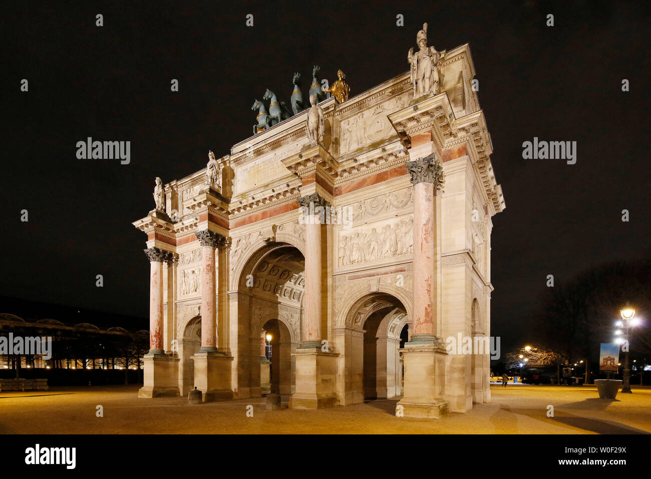Paris. 1st district. Louvre Museum by night. The triumphal arch of the ...