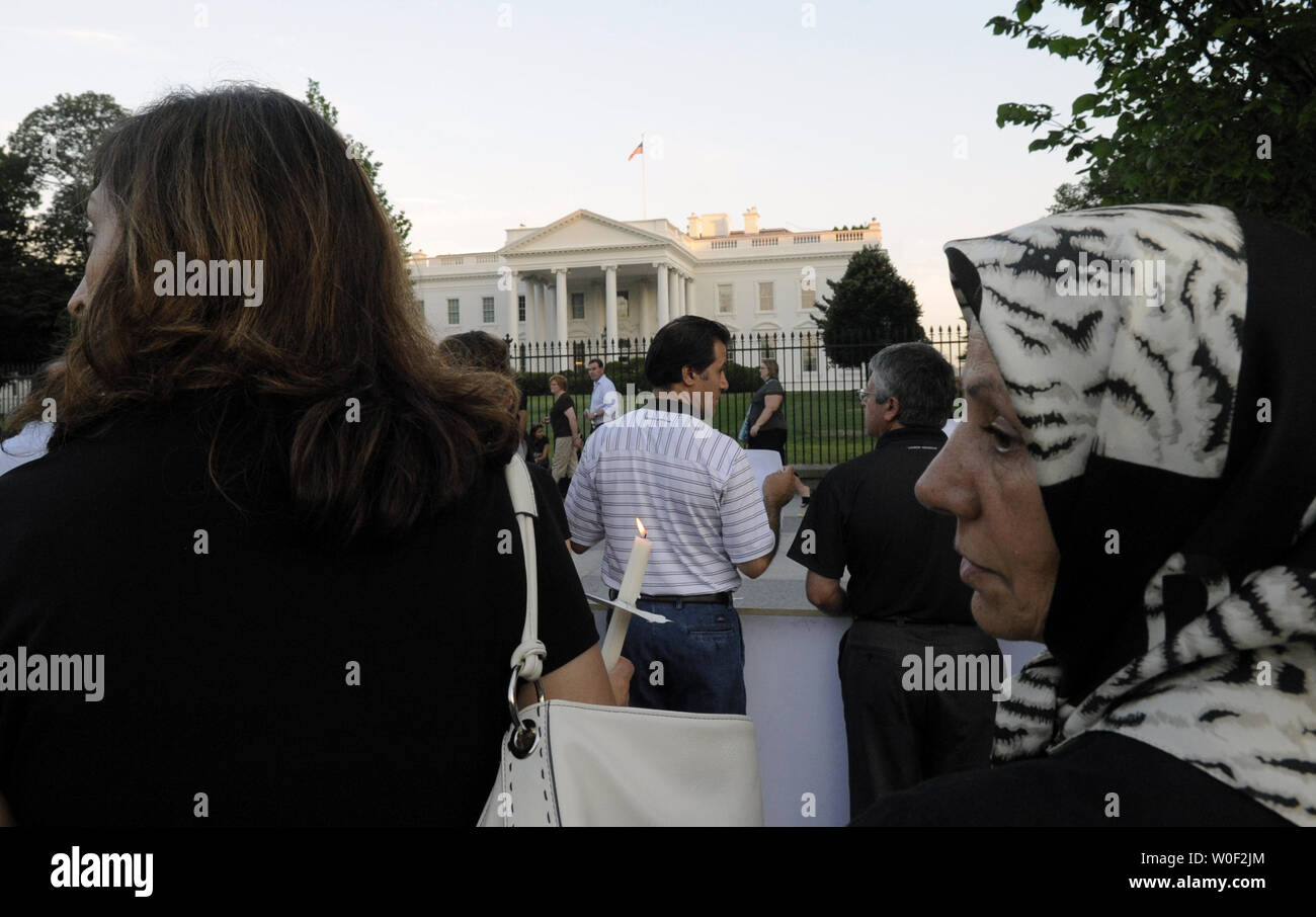 Members of the Iranian-American community gather for a candlelight ...