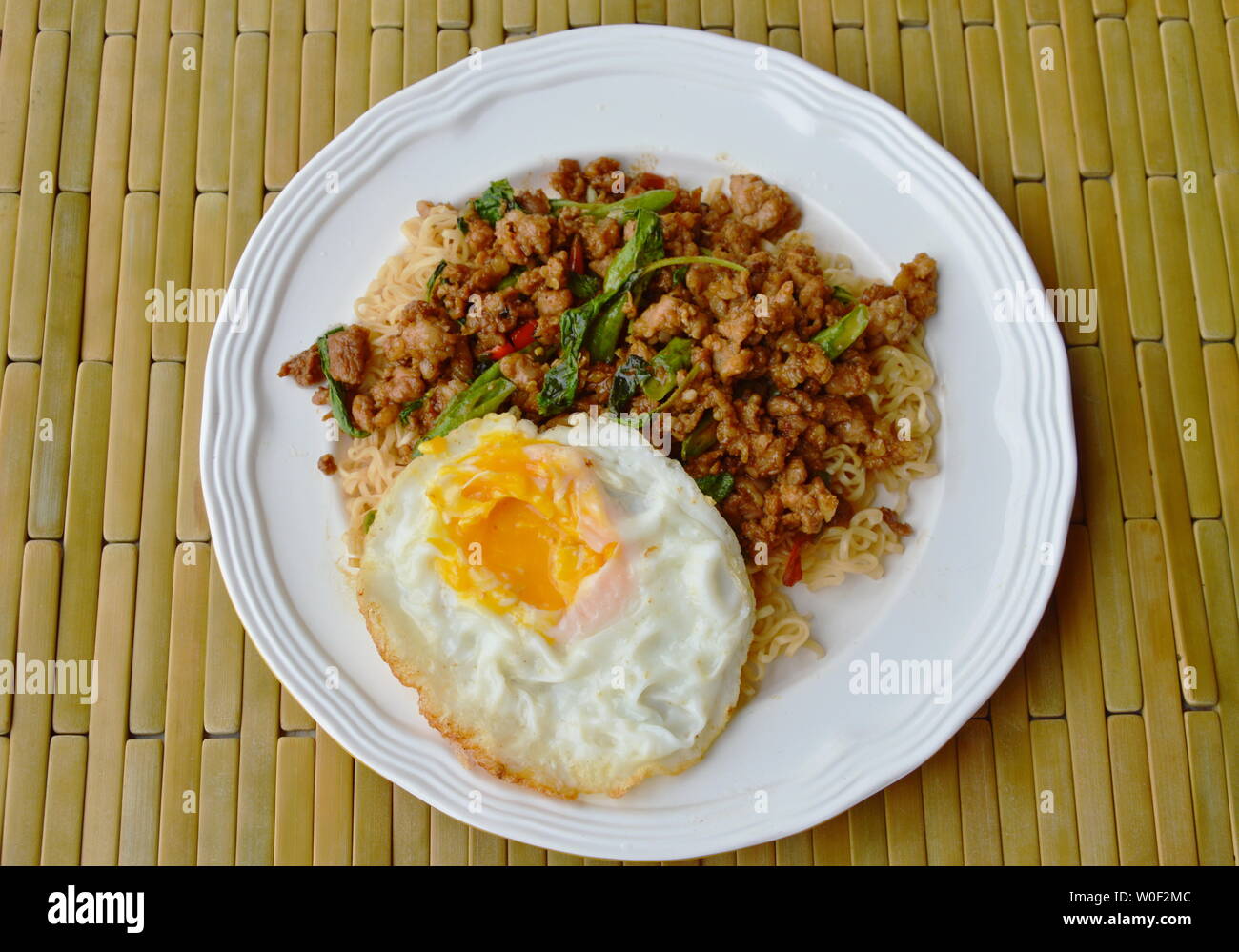 instant noodle topping spicy stir fried minced pork and basil leaf with ...