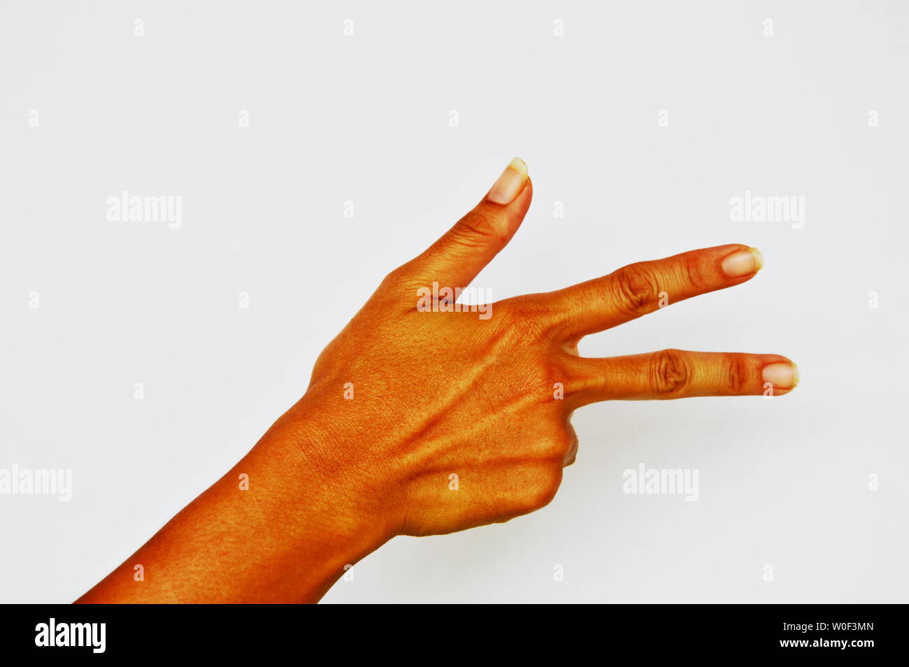 hand make three finger on white background Stock Photo - Alamy