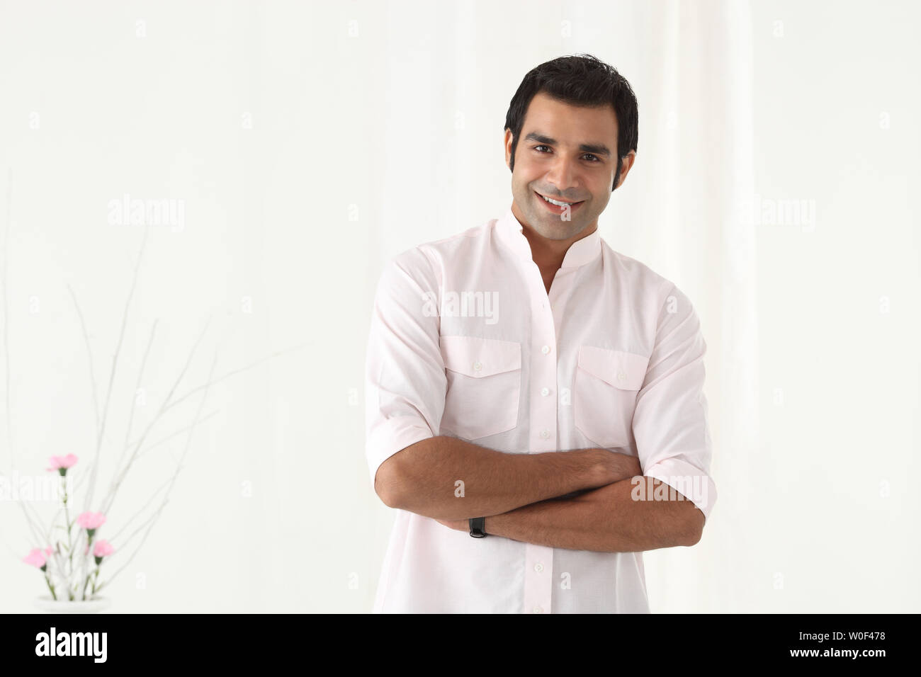 Portrait of an Indian young man smiling Stock Photo - Alamy