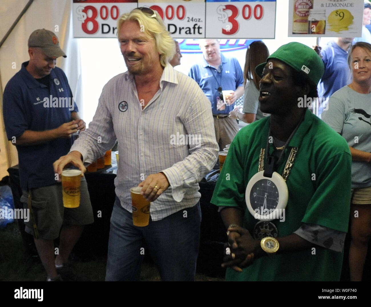 Virgin Records creator and owner Richard Branson and rapper William ...