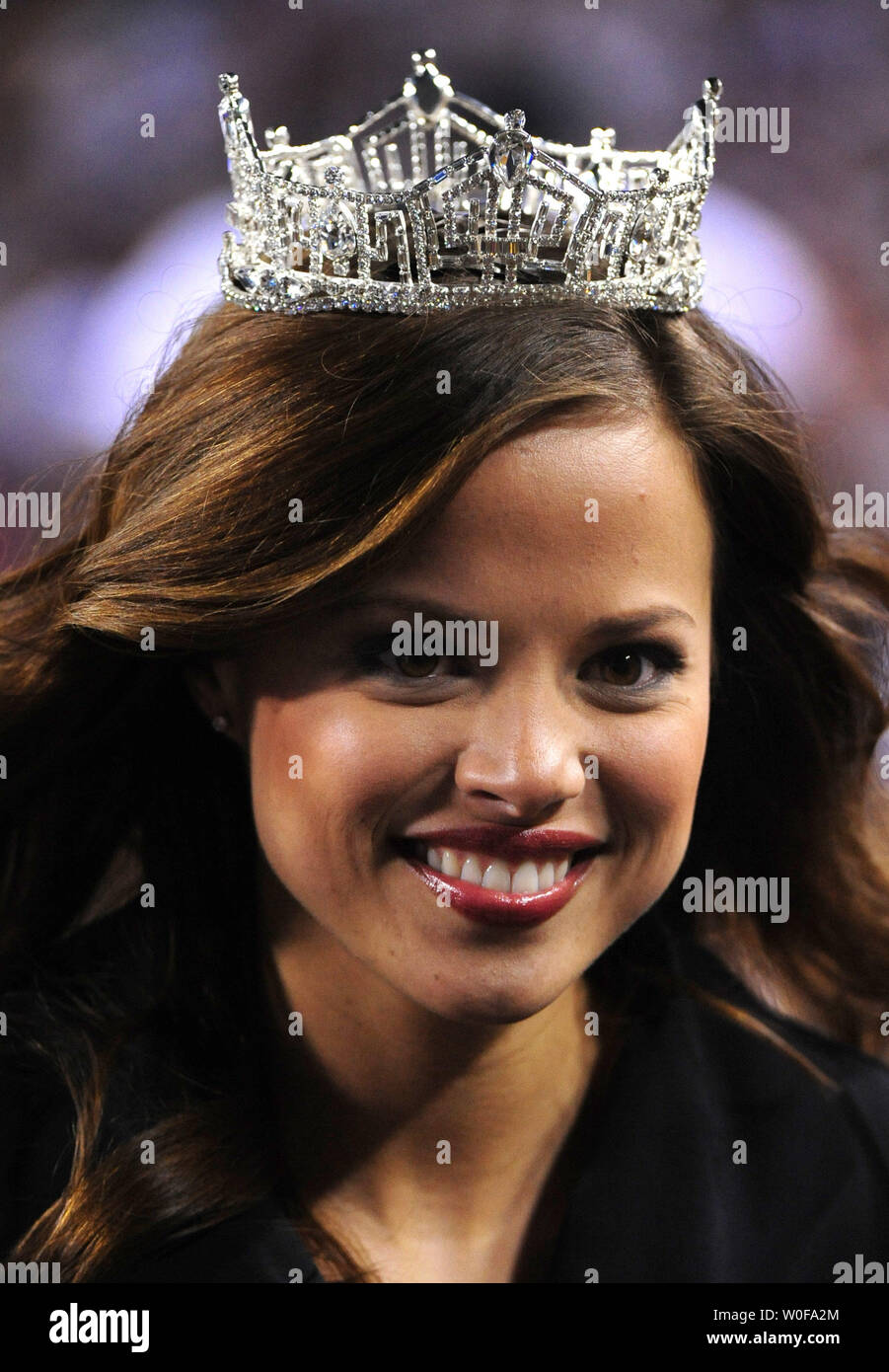 Katie Stam, Miss America 2009, leaves the field after signing the ...