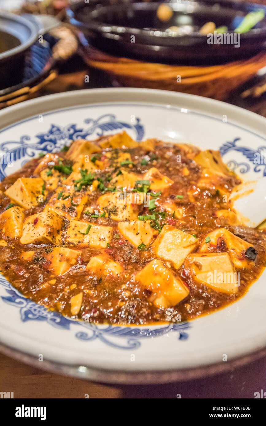 A tray of Mapo tofu close-up Stock Photo - Alamy