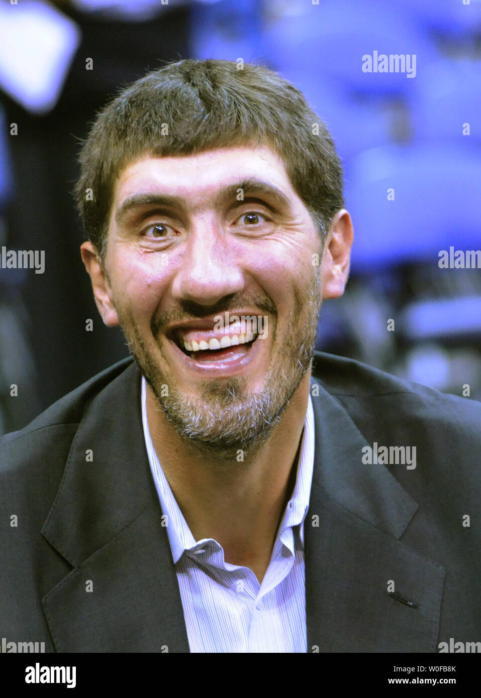 Former NBA player George Mureşan attends a game between the Detroit ...
