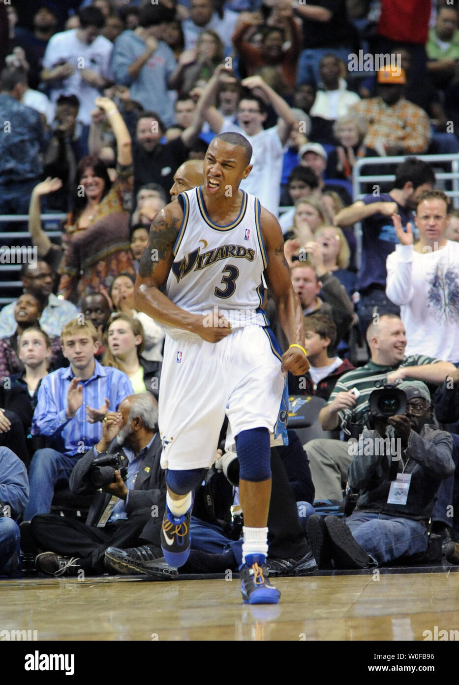 Washington Wizards Caron Butler jubilates after scoring against the ...