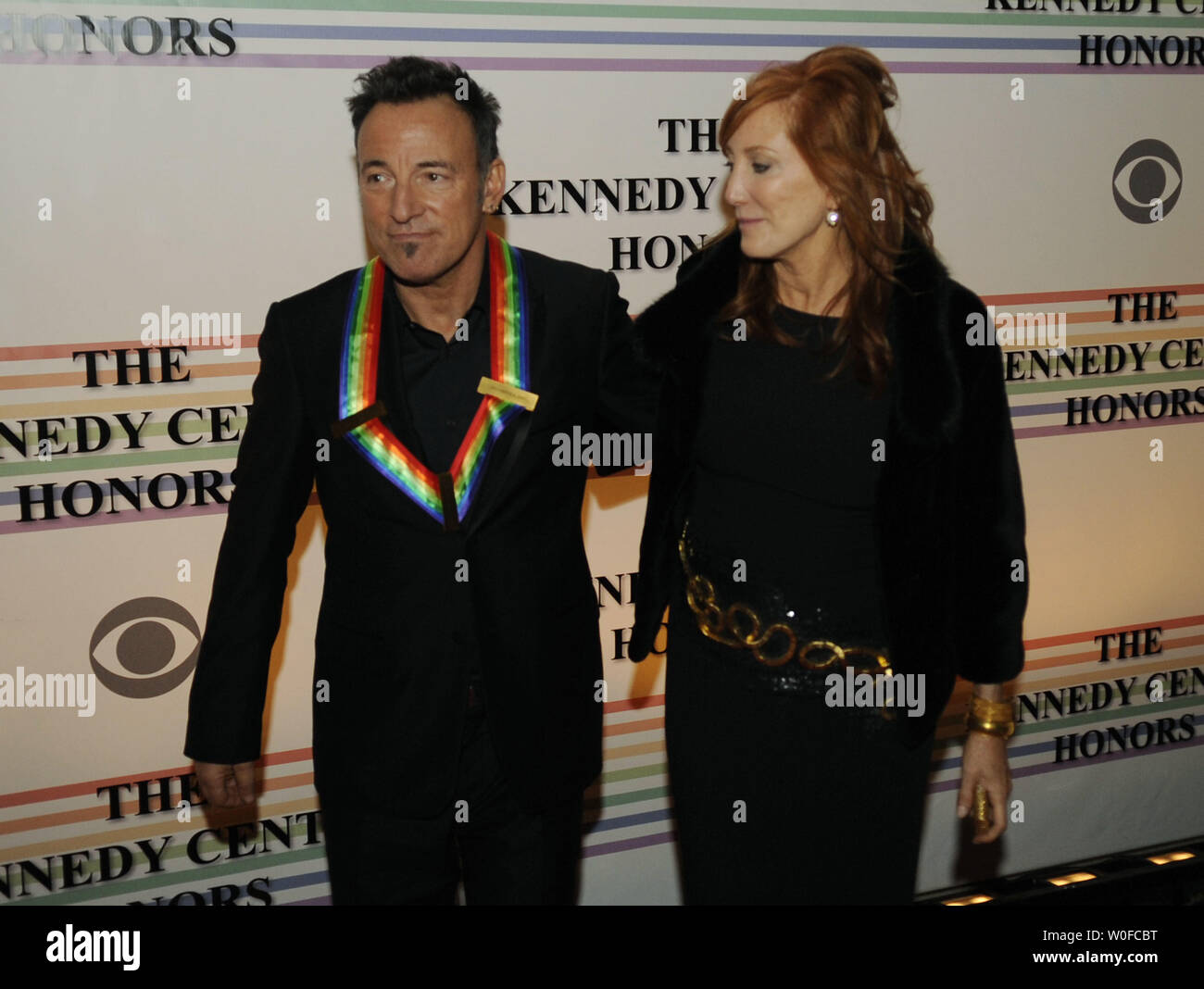 Honoree Bruce Springsteen and his wife Patti Scialfa arrive on the red carpet of the Kennedy ...
