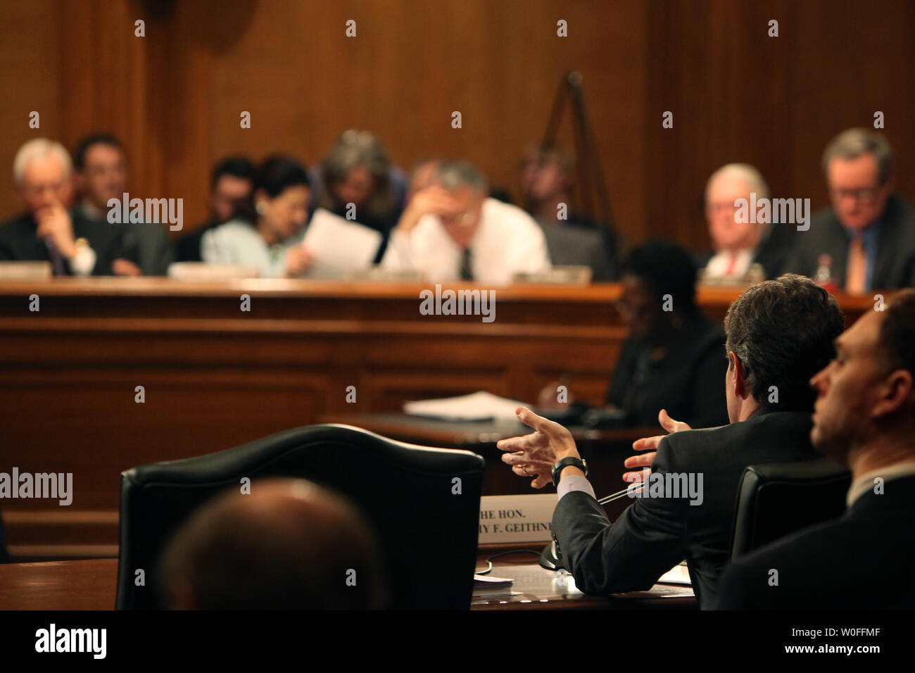 Treasury Secretary Timothy Geithner testifies before the Senate Finance ...