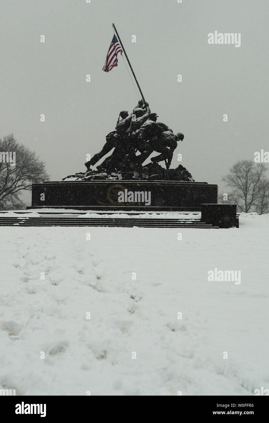 The Iwo Jima memorial is seen during a snow storm in Arlington ...