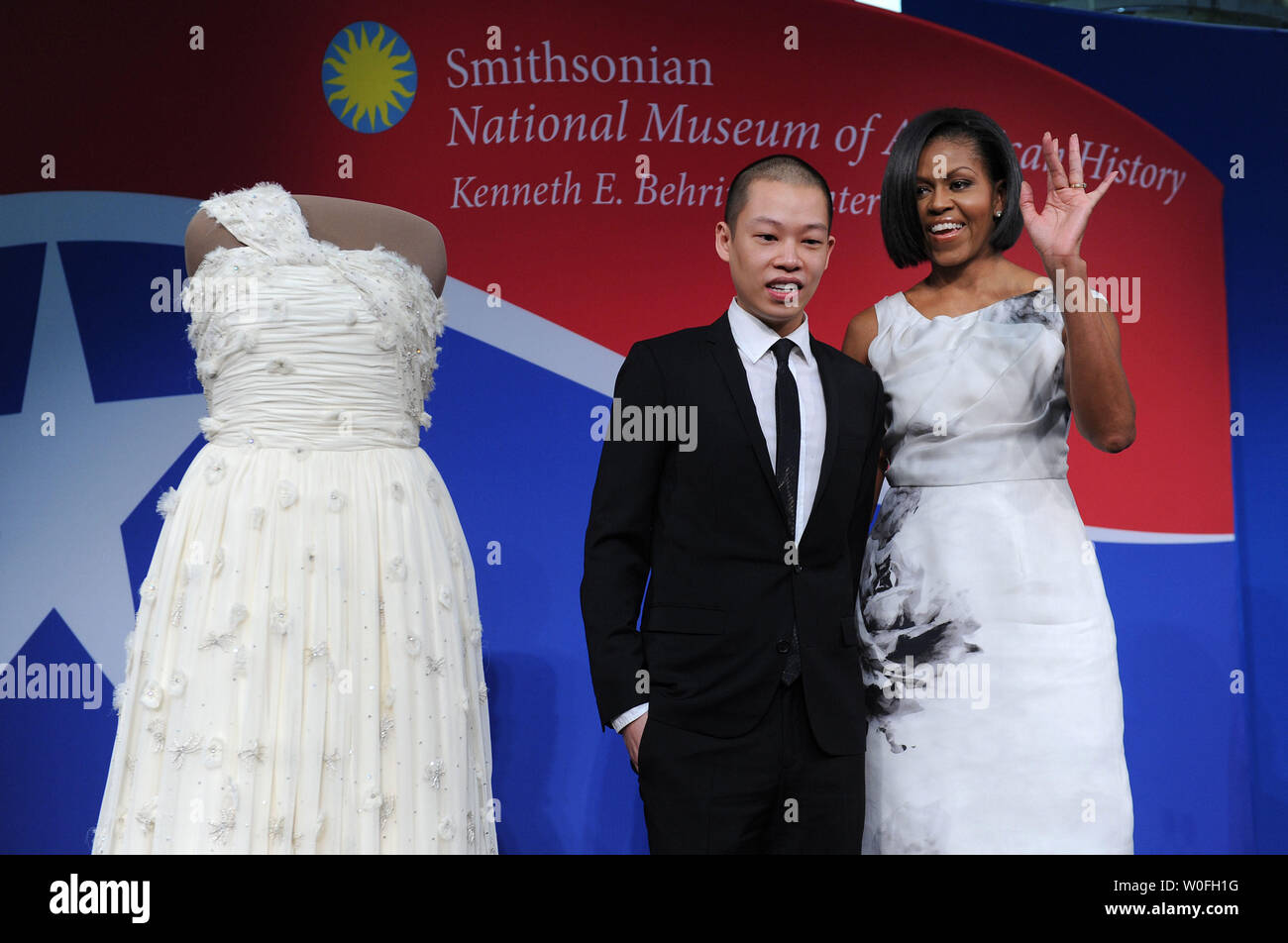 First Lady Michelle Obama and fashion designer Jason Wu pose during at ...