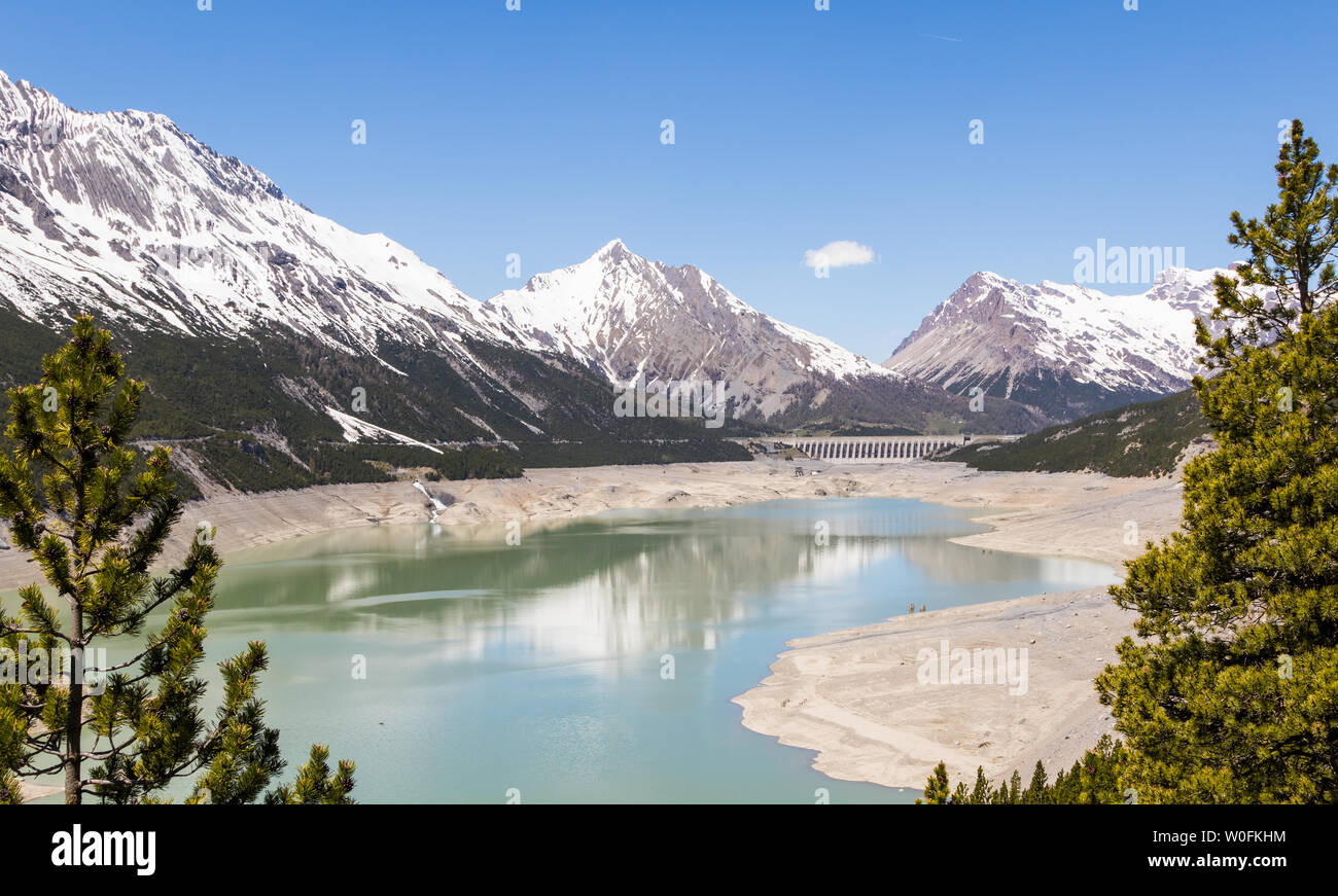 Alpine landscape with artificial lake, italy Stock Photo - Alamy