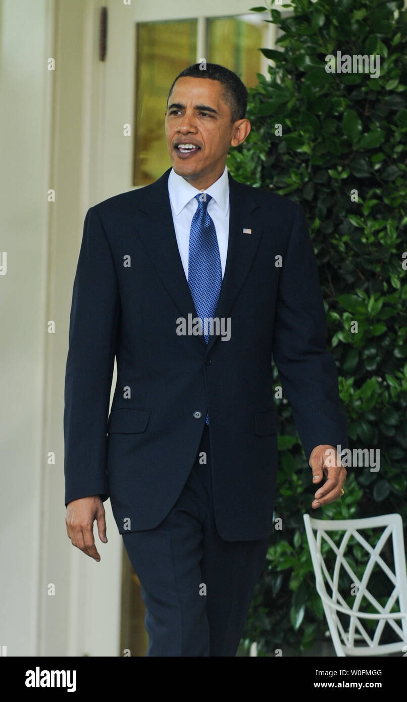 U.S. President Barack Obama walks out of the Oval Office to speak at an ...