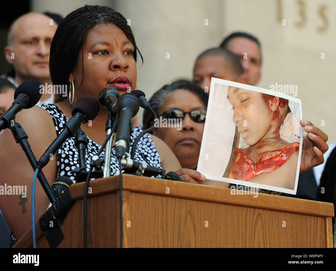 Nardyna Jefferies, mother of Brishell Jones, holds a photo of her slain ...