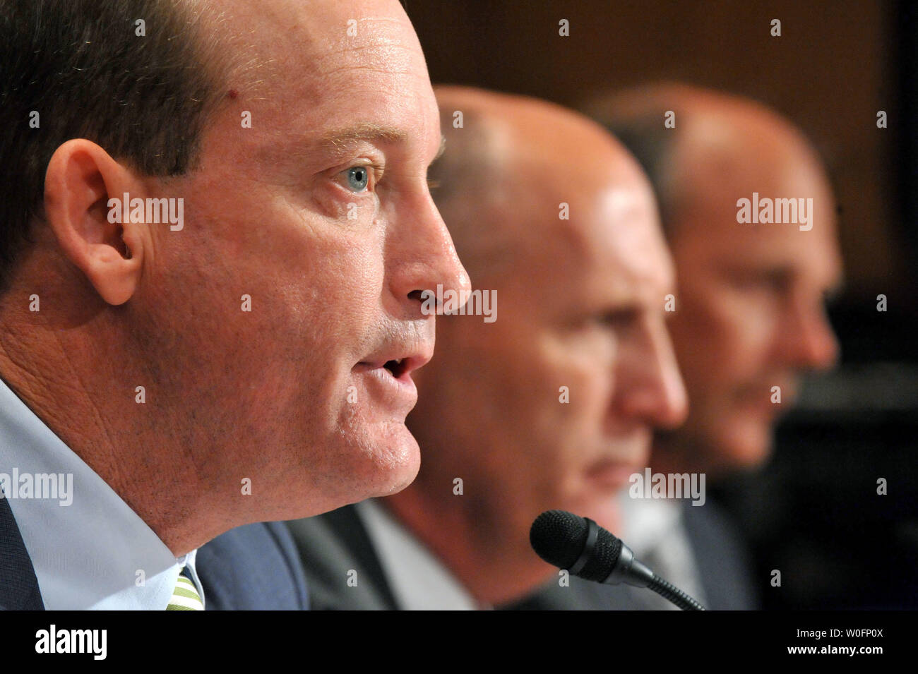 Lamar McKay (L), President and Chairman at BP America Inc. testifies ...