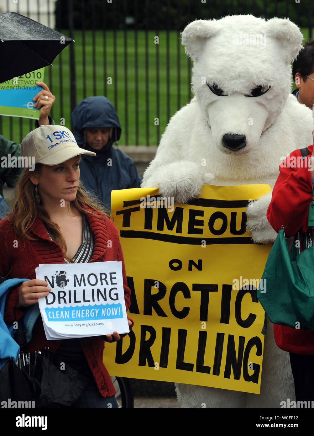 Environmental activists - including one dressed as a polar bear - hold ...