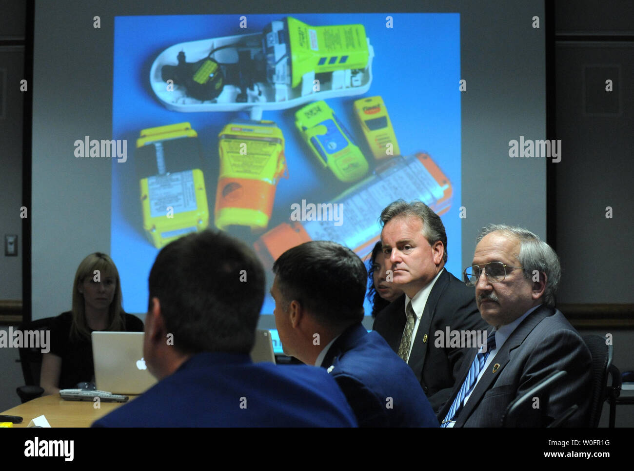 Mickey Fitzmaurice (2nd-R), NOAA SARSAT Systems Engineer, and Dave ...