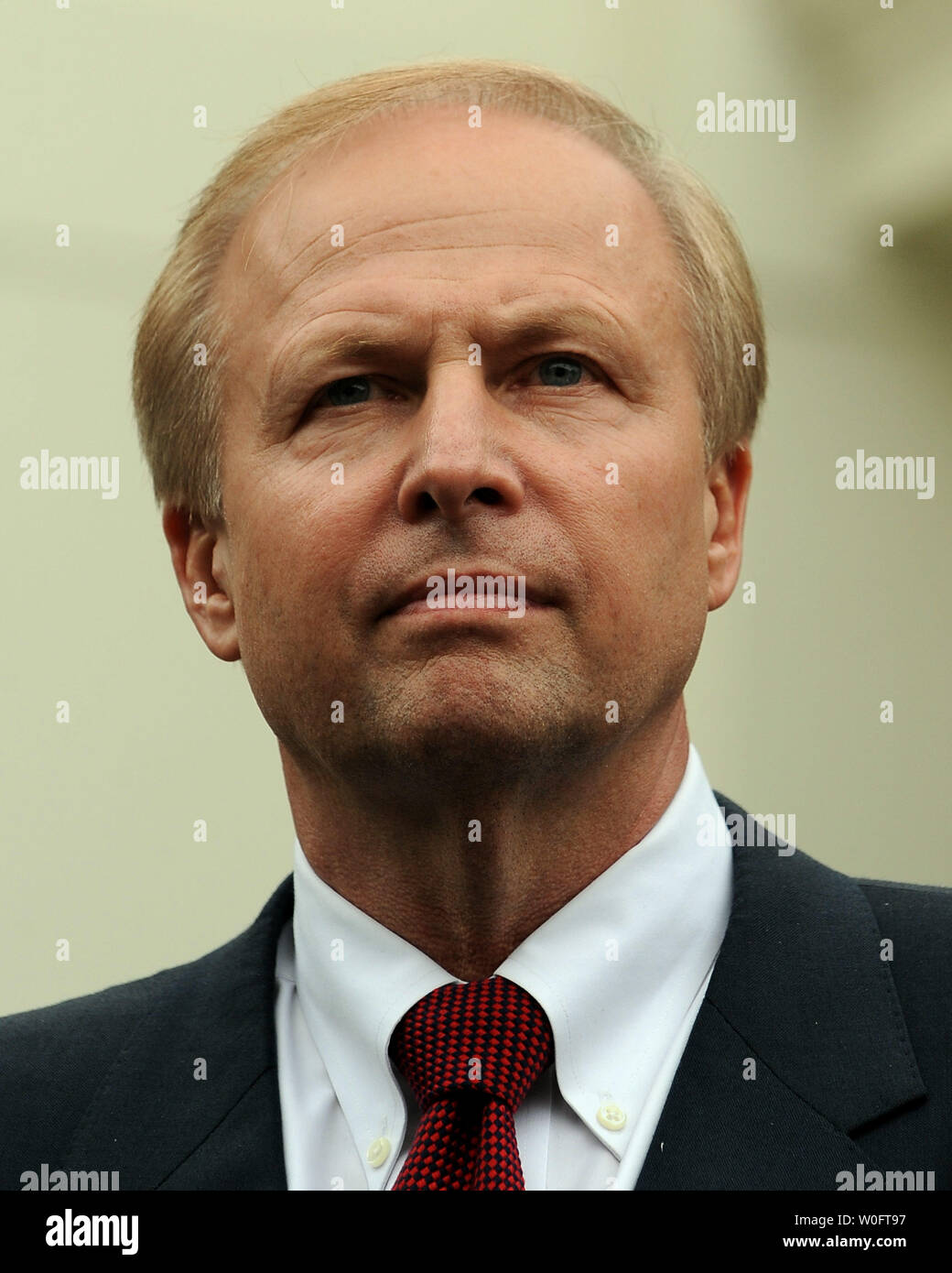 BP Managing Director Bob Dudley listens as BP Chairman Carl-Henric ...