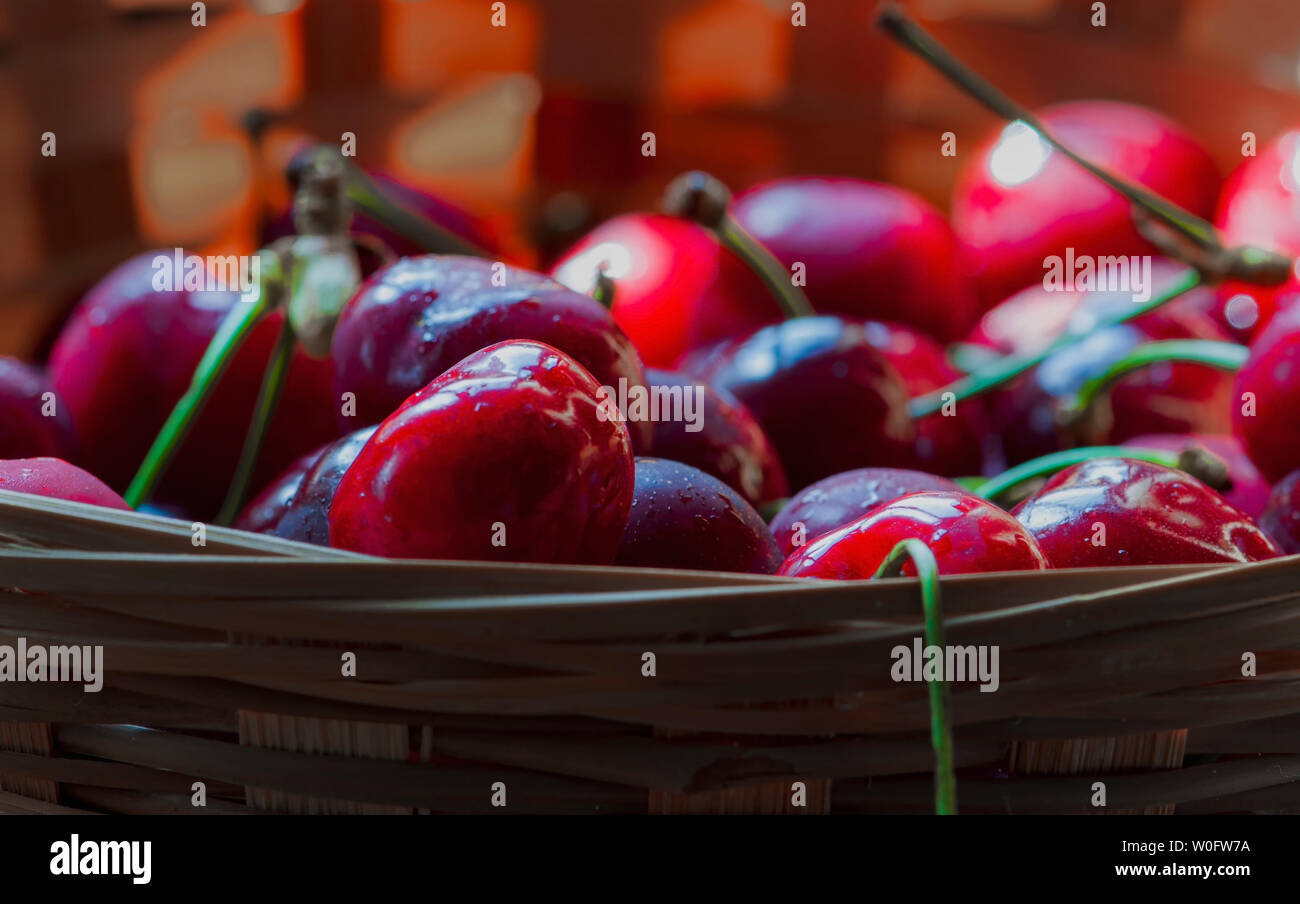 Cherries in the shopping basket hi-res stock photography and images - Alamy