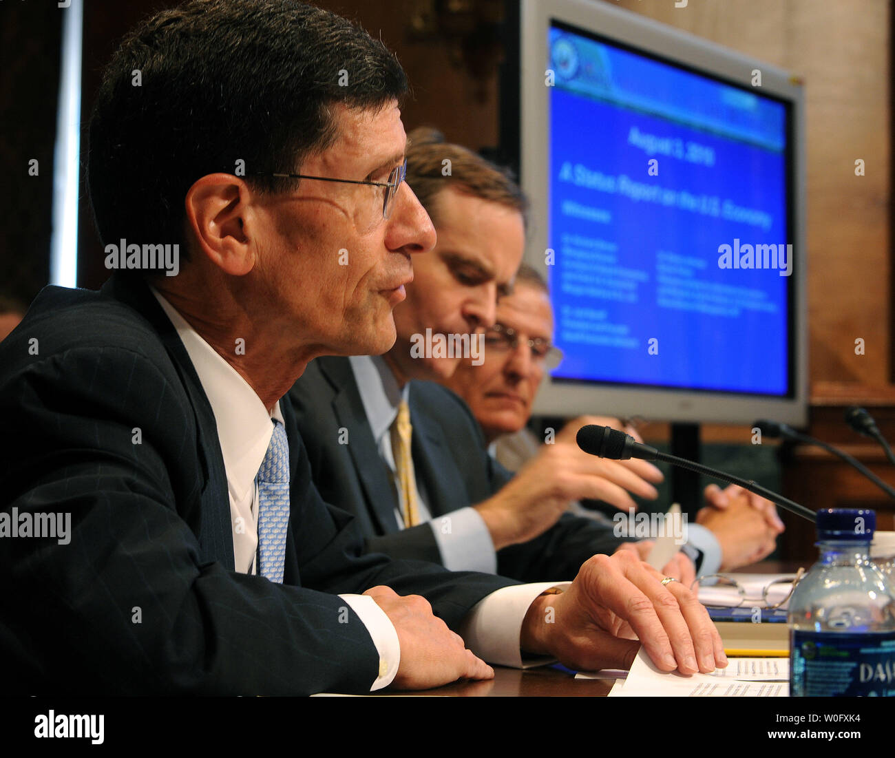 Economists Richard Berner, Simon Johnson and Joel Naroff (L to R ...