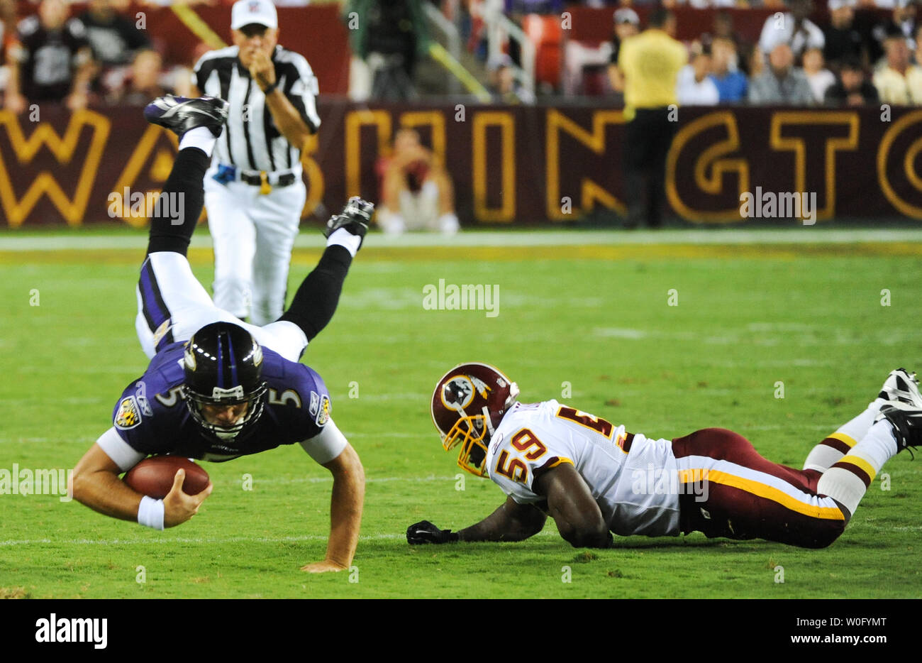 Baltimore Ravens Joe Flacco is hit by Washington Redskins London ...