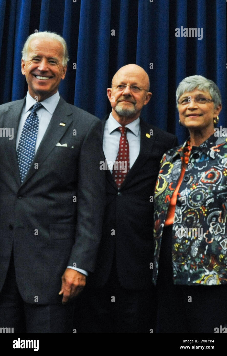 U.S. Vice President Joe Biden (L) smiles after he swore-in Director of ...