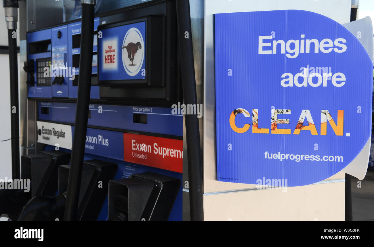 A gas pump is seen at an Exxon gas station in Arlington, Virginia on ...