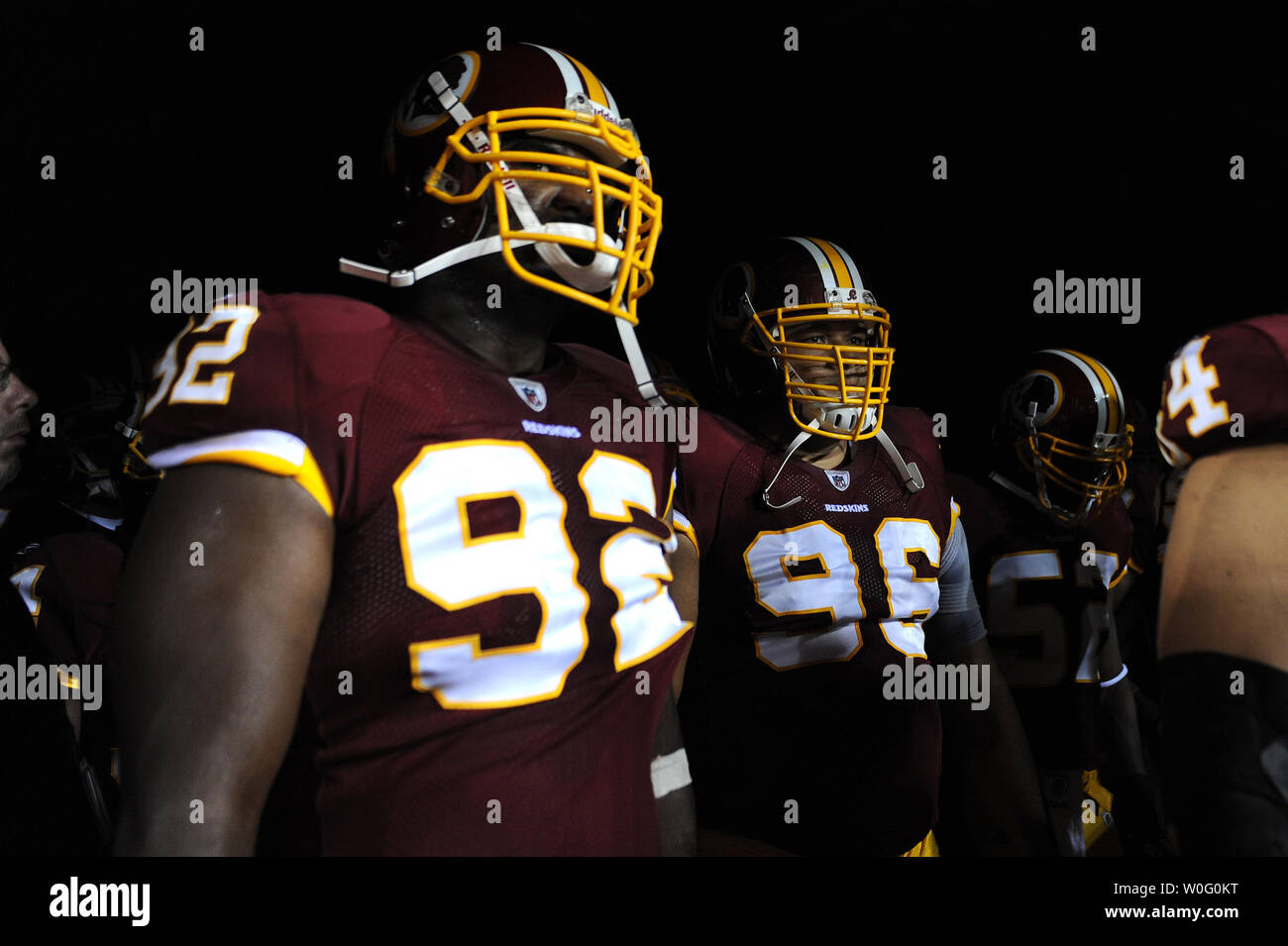 Washington Redskins Albert Haynesworth (R) and other members of the ...