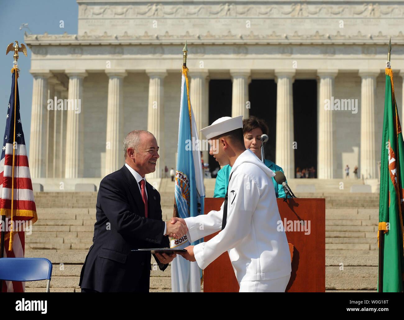 USCIS Director Alejandro Mayorkas gives Corpsman Johnny Alexander ...