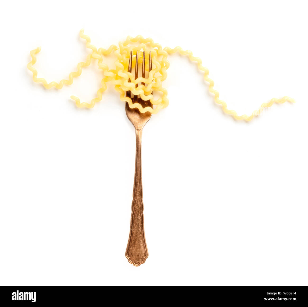 Italian pasta. An overhead photo of a vintage style fork with long ...