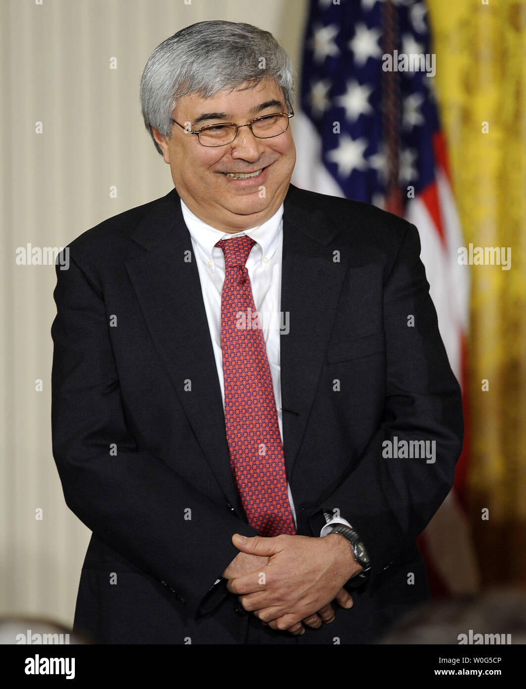 Interim Chief of Staff Pete Rouse laughs as U.S. President Barack Obama ...