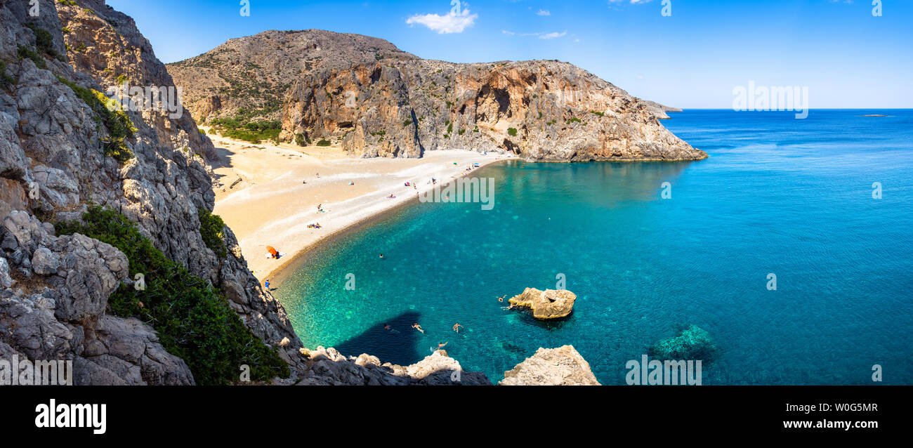Agiofarago beach with natural caves and stone arches at the end of the ...