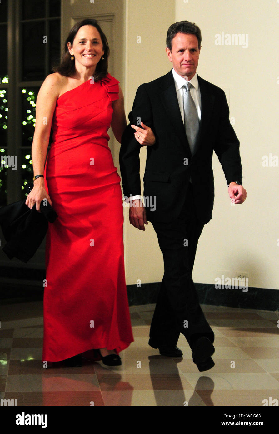 Treasury Secretary Tim Geithner and his wife Carole arrive for the ...