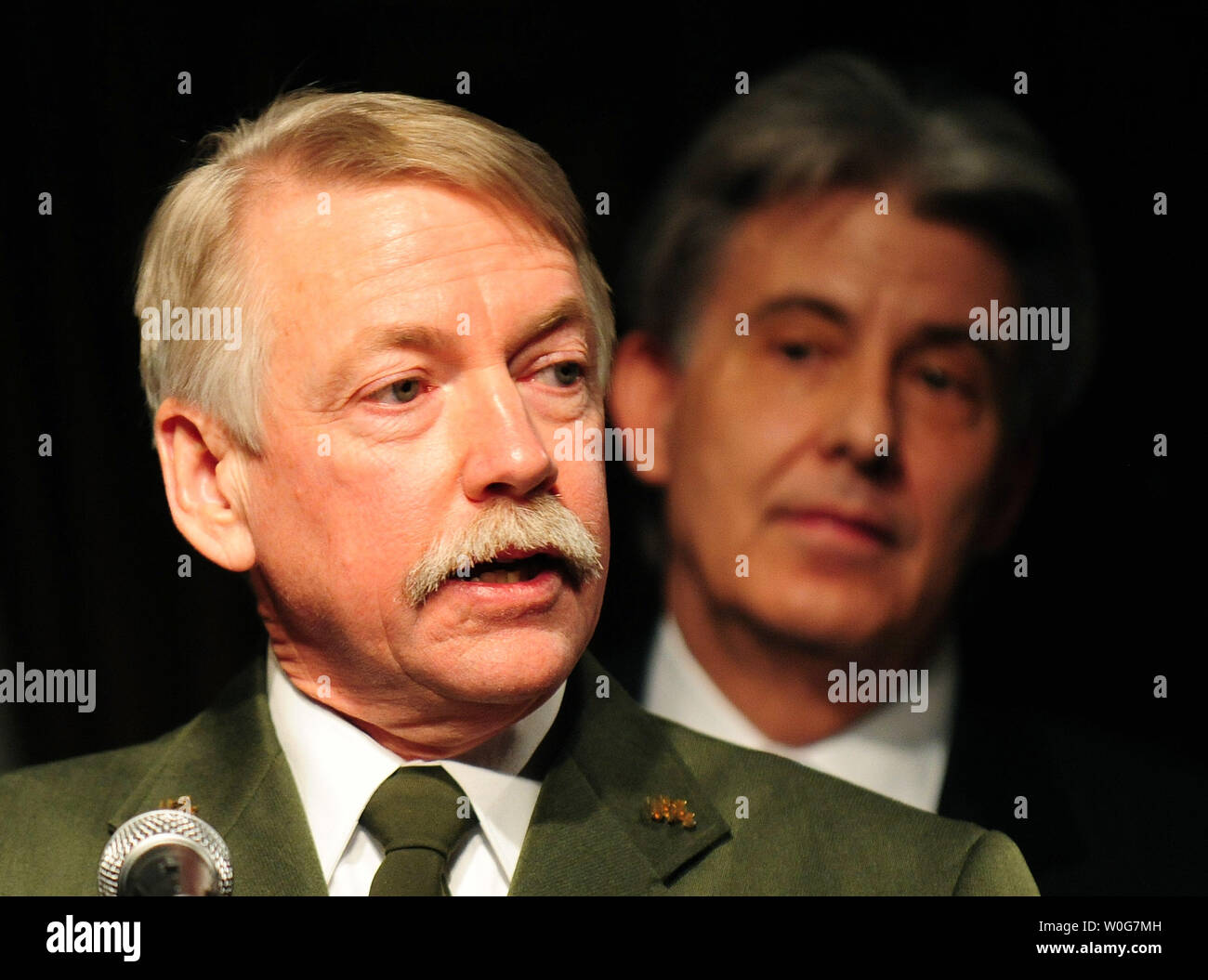 Jon Jarvis, director of the National Park Service, speaks alongside ...