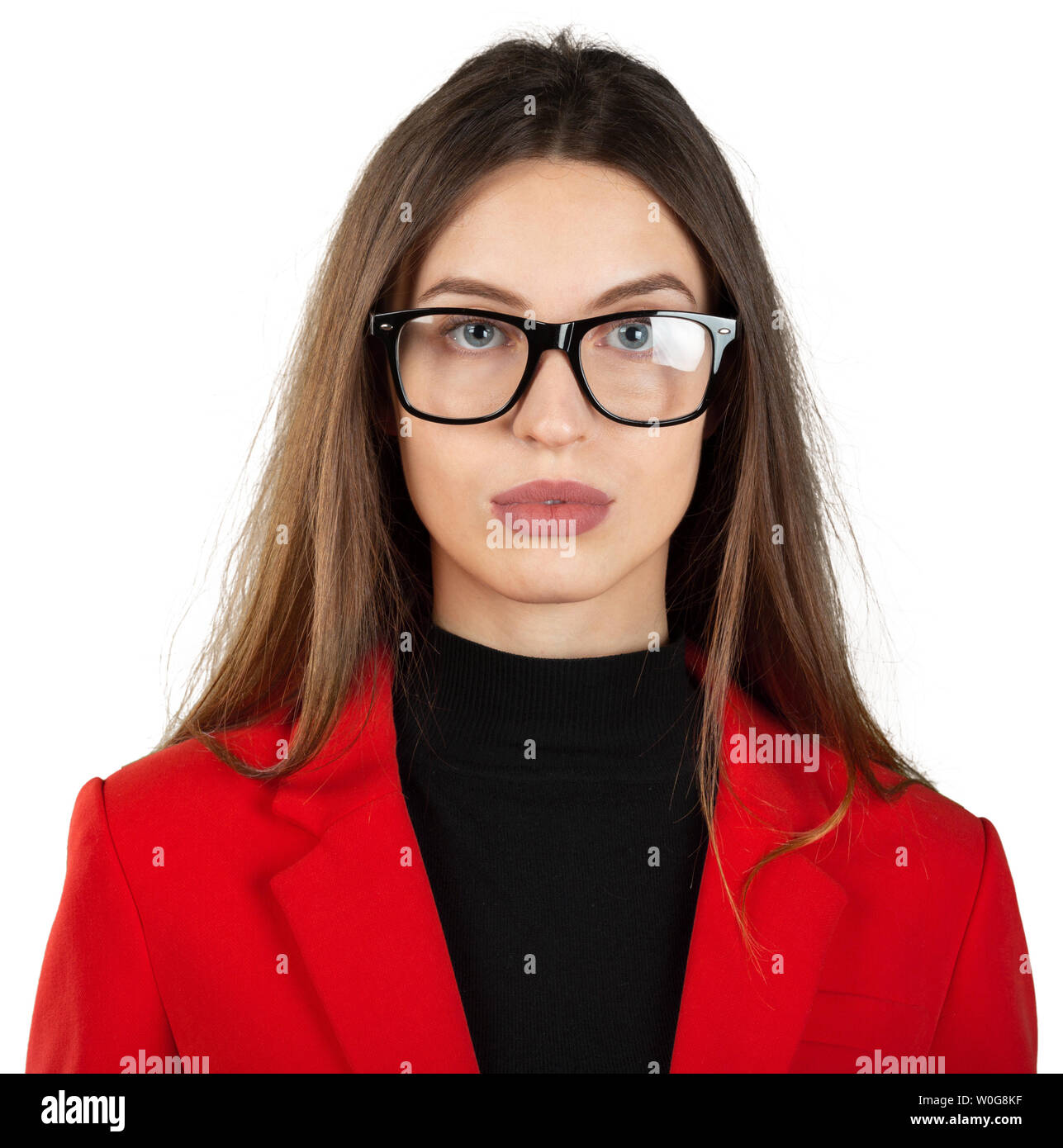 Confident young manager on white background Stock Photo - Alamy