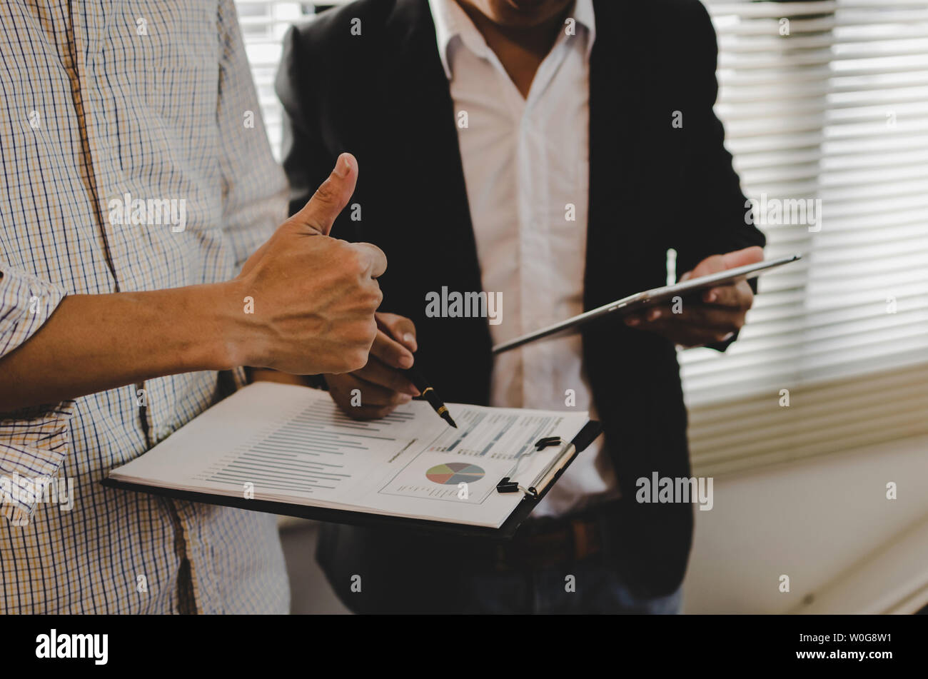 Good job man. business Boss team leader encourage and showing thumbs up ...