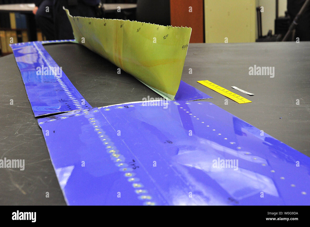 The damage section of fuselage skin from Southwest flight 812 is seen ...